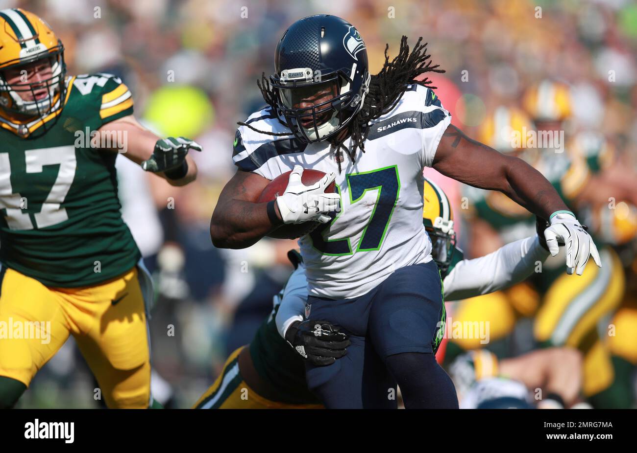 Seattle Seahawks running back Eddie Lacy (27) runs the ball against the ...