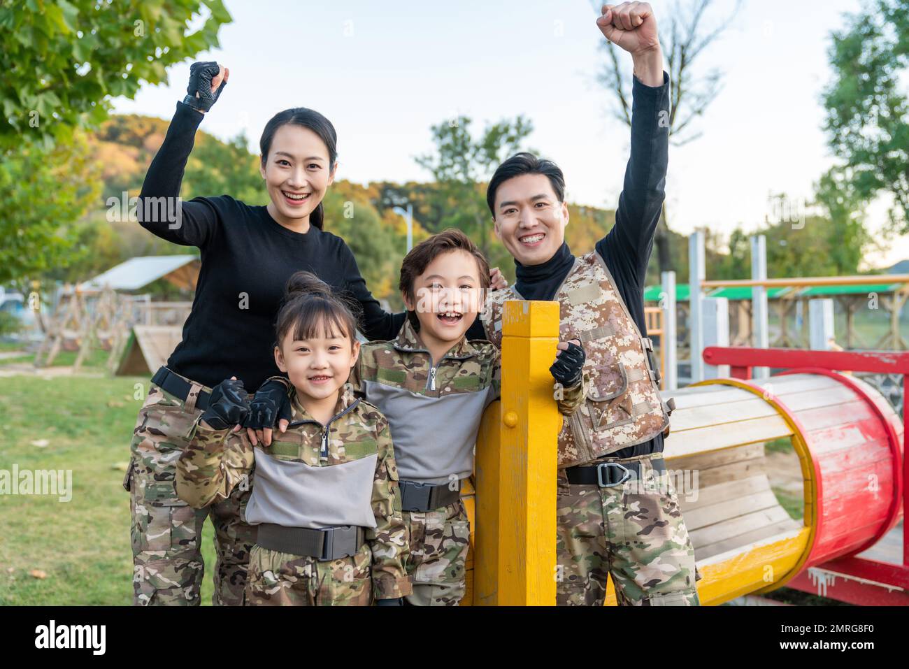 Happy family play cs Stock Photo - Alamy