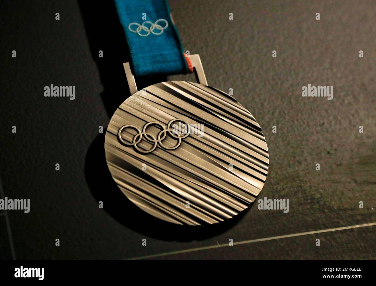 An Olympic silver medal hangs on display during an unveiling ceremony ...