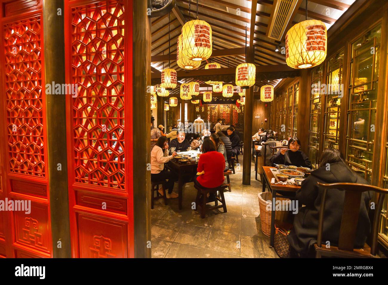NANJING, CHINA - JANUARY 31, 2023 - Tourists enjoy Jinling style food ...