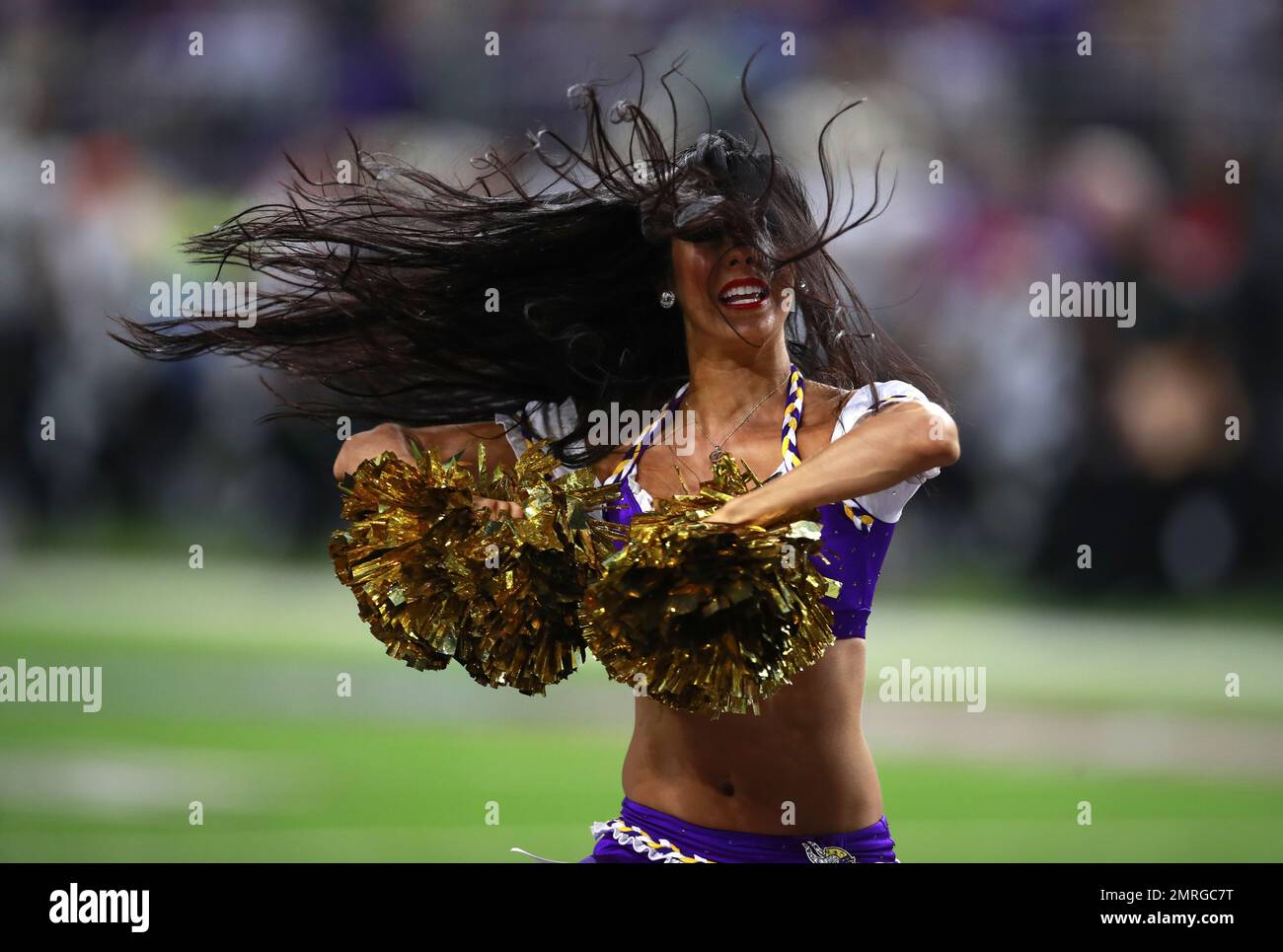 Minnesota Vikings cheerleaders perform during an NFL football game ...