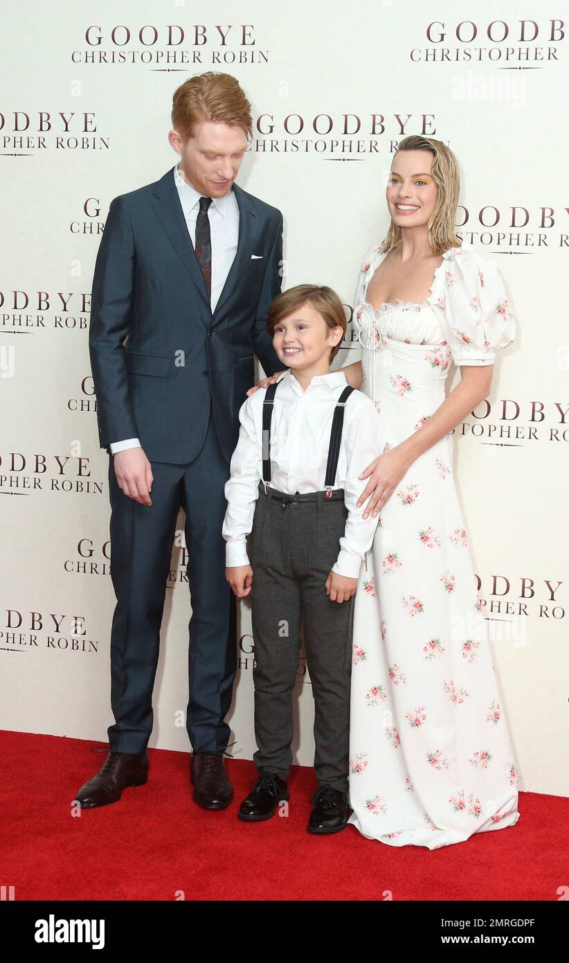 Actors Domhnall Gleeson, from left, Will Tilston and Margot Robbie pose ...