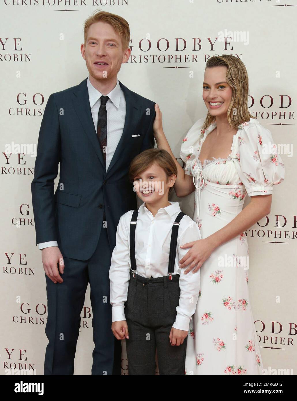 Actors Domhnall Gleeson, from left, Will Tilston and Margot Robbie pose ...