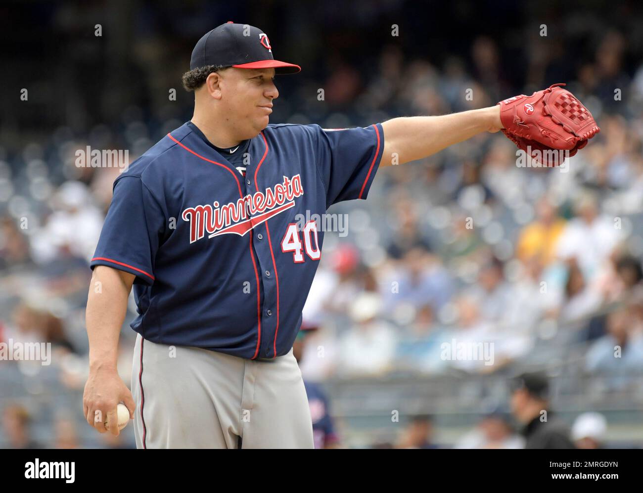 Minnesota Twins pitcher Bartolo Colon reacts towards the New York ...