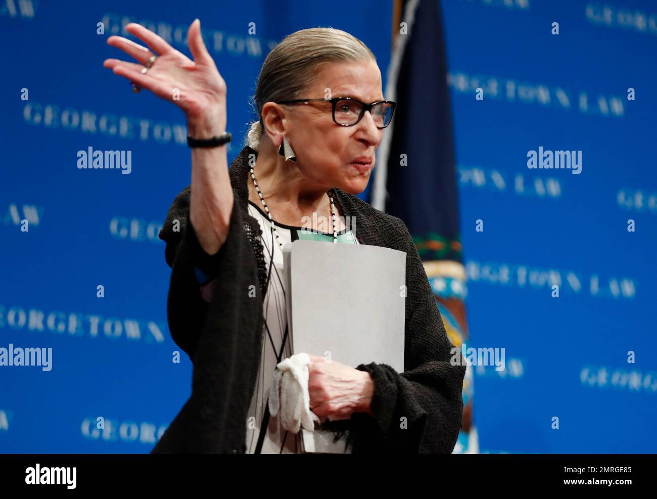 U.S. Supreme Court Justice Ruth Bader Ginsburg waves to the audience ...