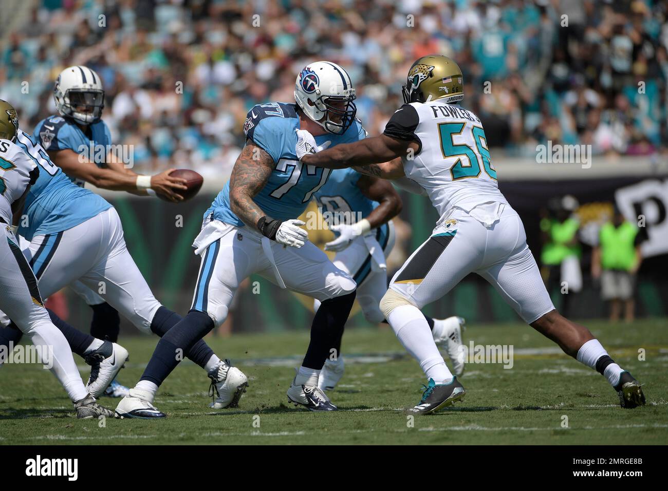 Tennessee Titans offensive tackle Taylor Lewan (77) blocks against ...