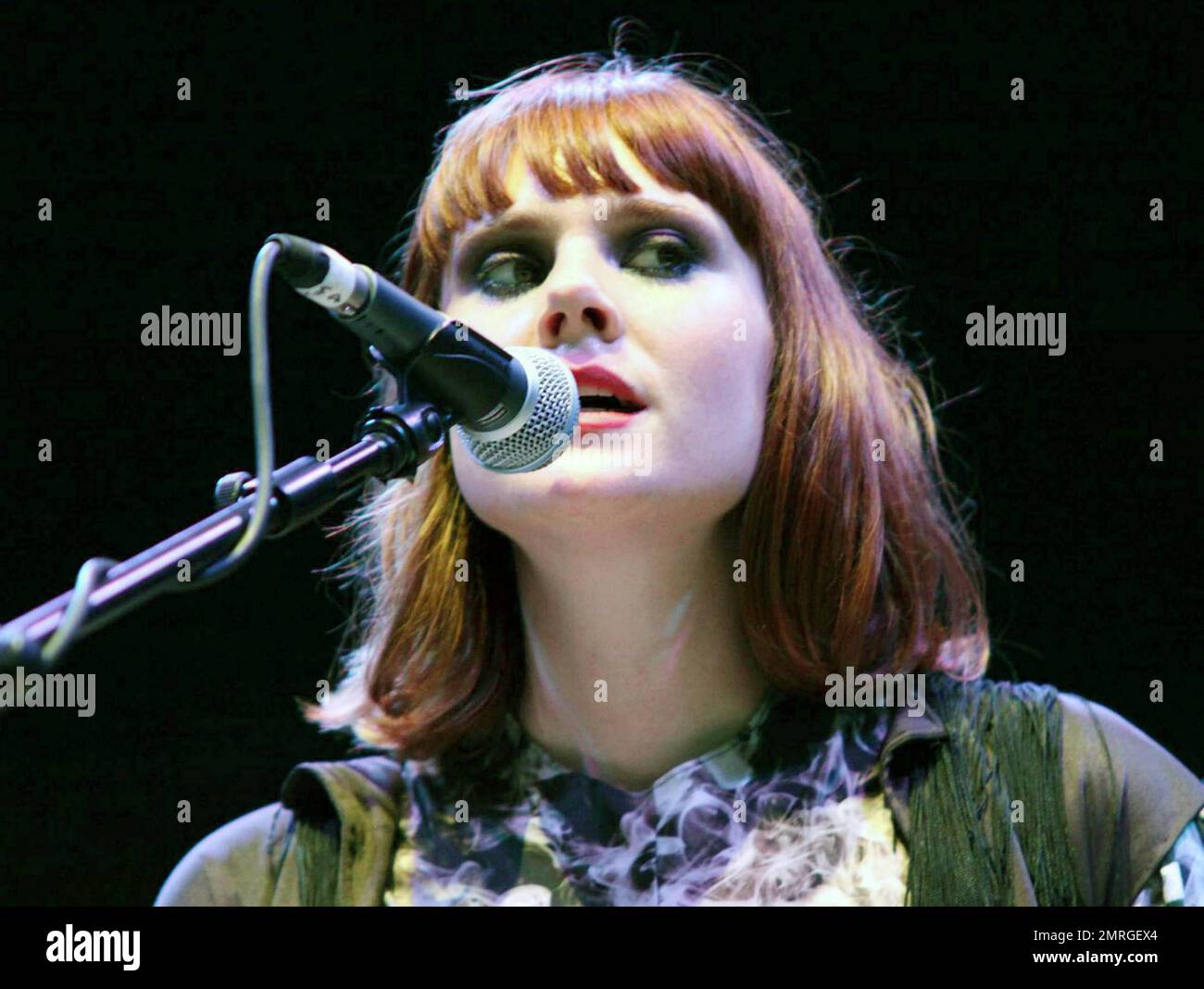 British singer songwriter Kate Nash plays a keyboard while performing ...