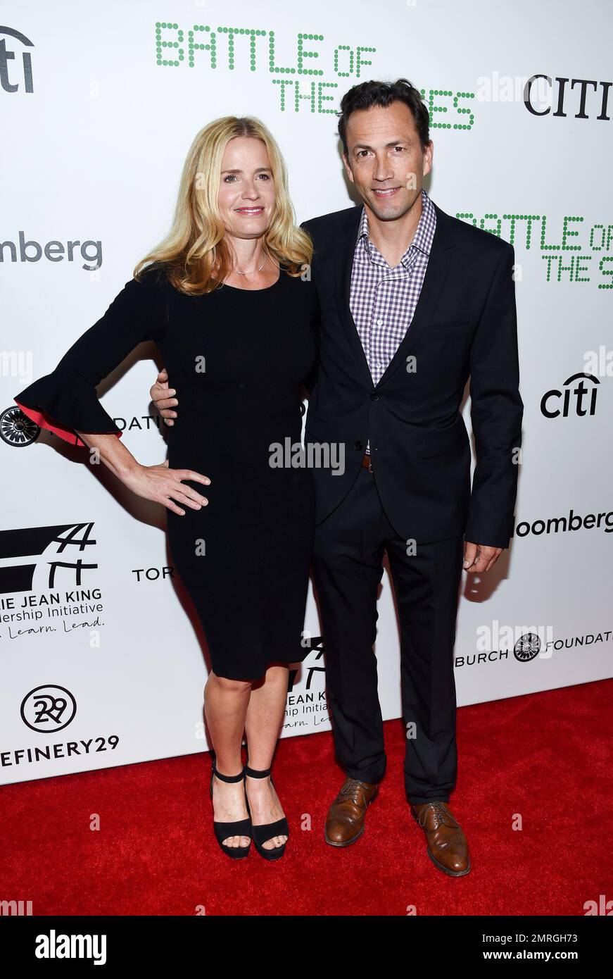 Actress Elisabeth Shue, left, and her brother Andrew Shue attend a ...