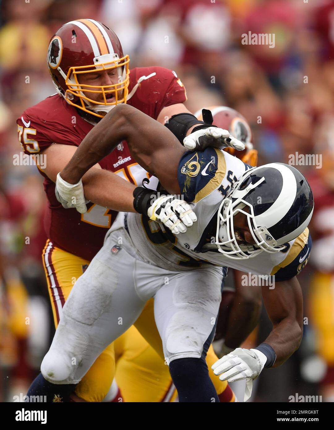 Los Angeles Rams outside linebacker Robert Quinn (94) attempts to move ...