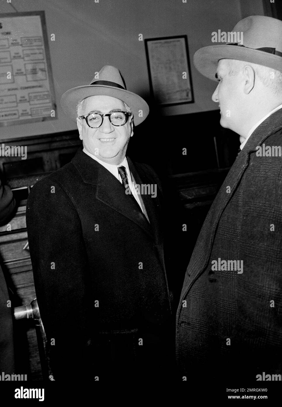 Paul "Frankie" Carbo, smiles as he is booked on a misdemeanor charge ...