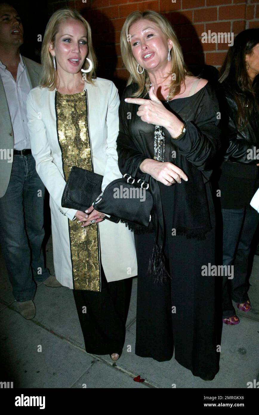 Kathy Hiton, wearing a revealing sheer blouse, leaves the restaurant Mr ...