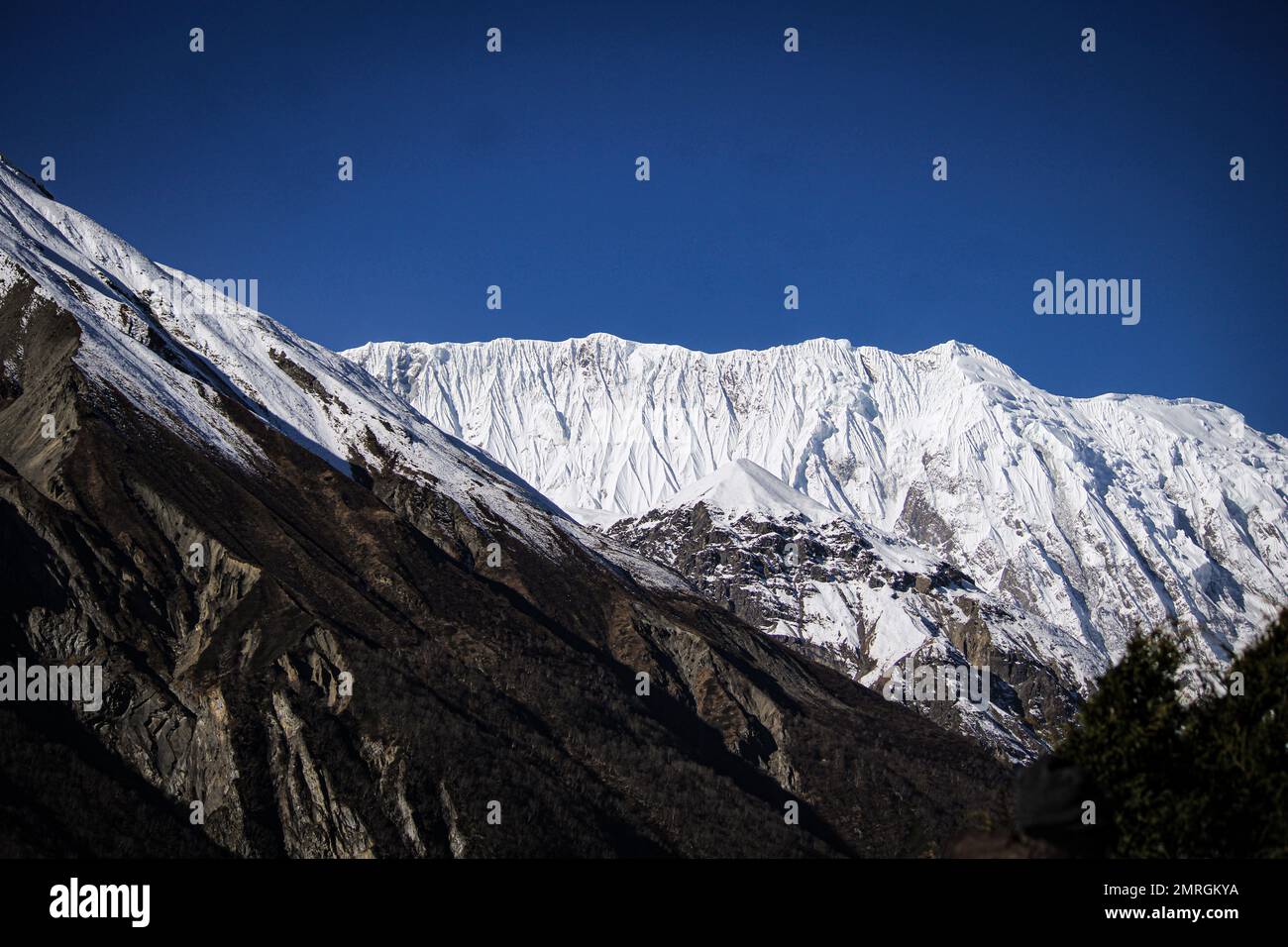 The giant Annapurna mountain range from Manang Stock Photo - Alamy
