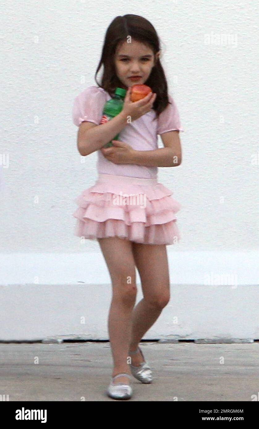 After spending some time together at the pool earlier in the day, Katie ...