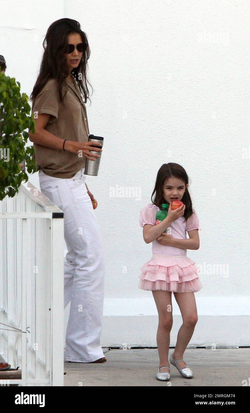 After spending some time together at the pool earlier in the day, Katie ...