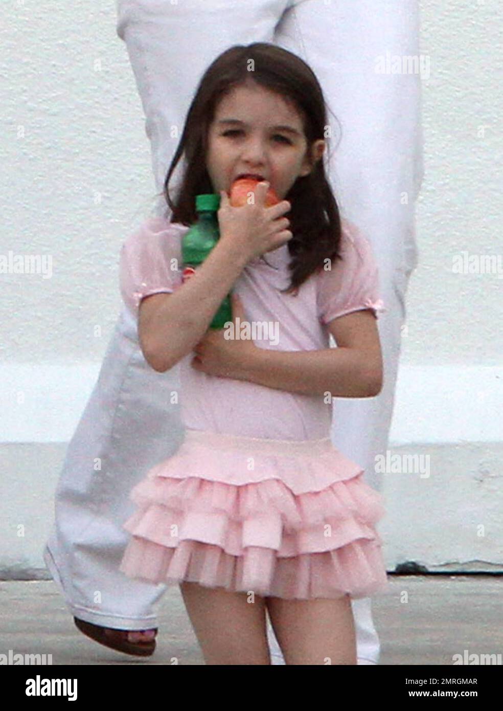 After spending some time together at the pool earlier in the day, Katie ...