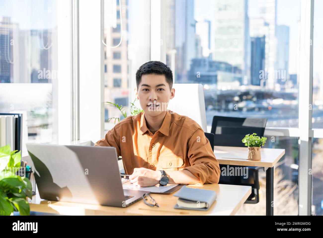 A young man in the office Stock Photo - Alamy