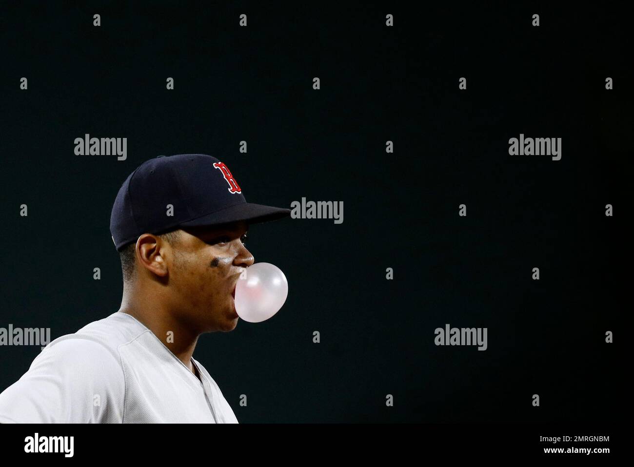 Boston Red Sox third baseman Rafael Devers stands in the infield during ...