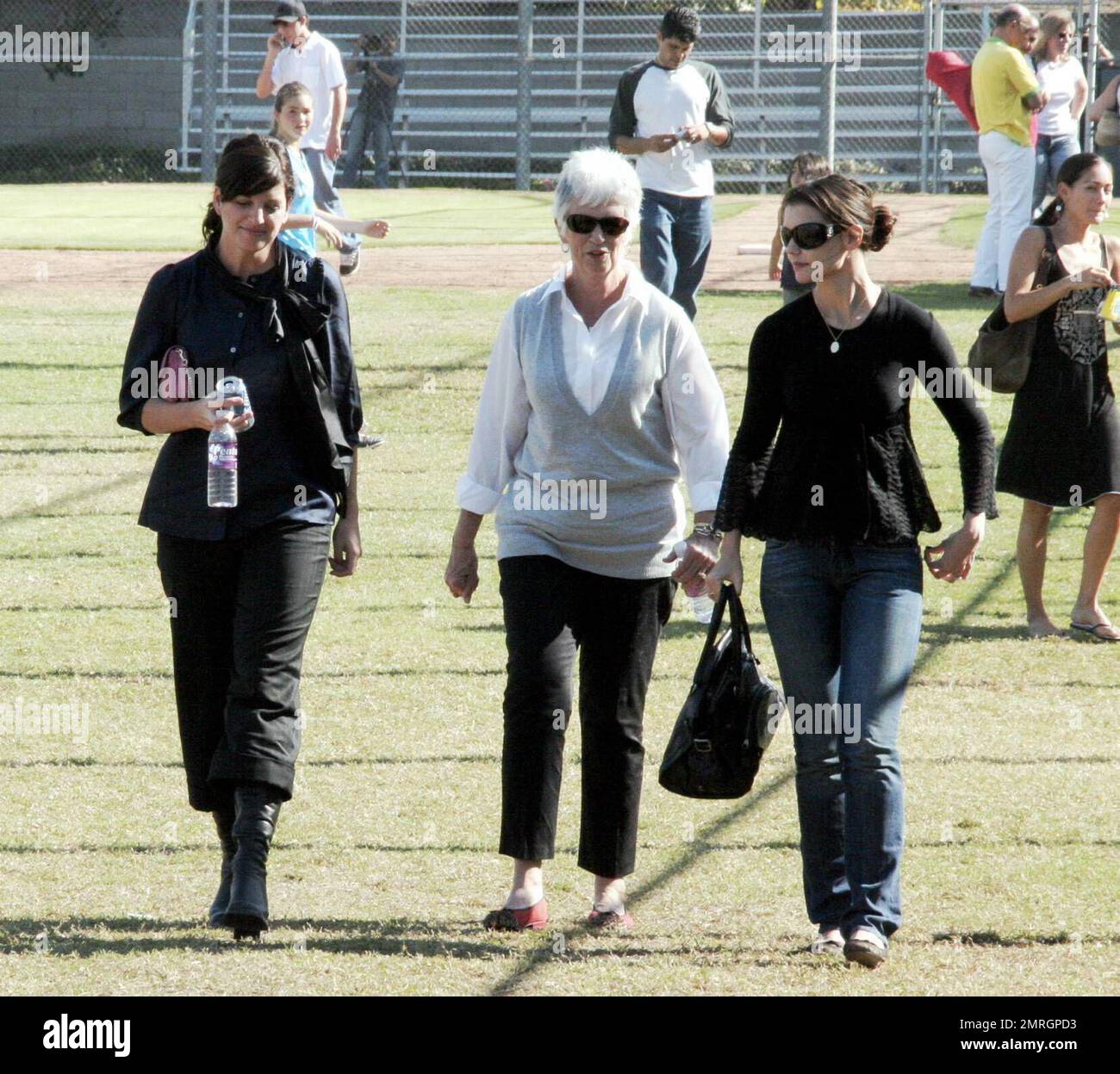 Katie Holmes makes another trip to the ball park, this time with her ...
