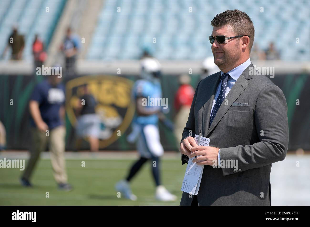 Tennessee Titans general manager Jon Robinson watches warmups before an ...