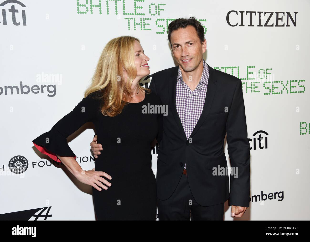 Actress Elisabeth Shue, left, and her brother Andrew Shue attend a ...