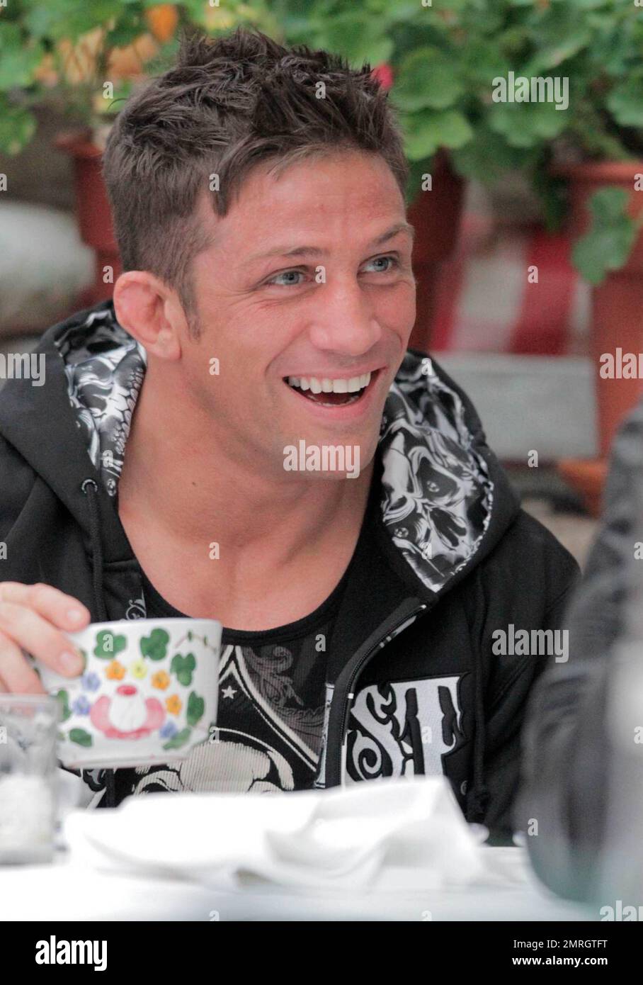 Katie Price and new husband Alex Reid get cuddly as they lunch at The ...
