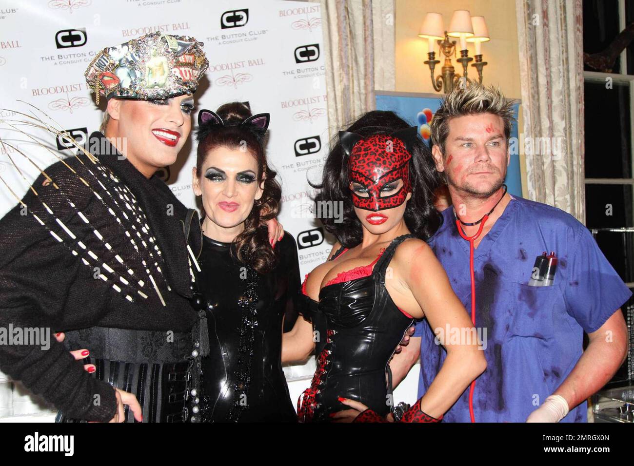 Katie Price dressed in her raunchy Domanatrix cat Halloween costume ...