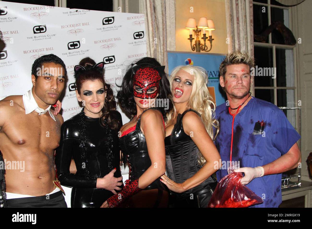 Katie Price dressed in her raunchy Domanatrix cat Halloween costume ...
