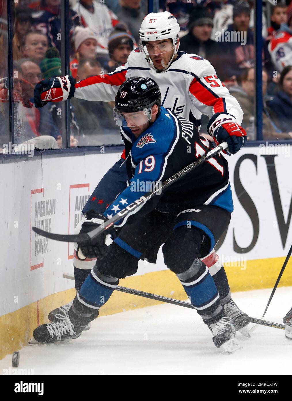 Washington Capitals defenseman Trevor van Riemsdyk, top, reaches for ...