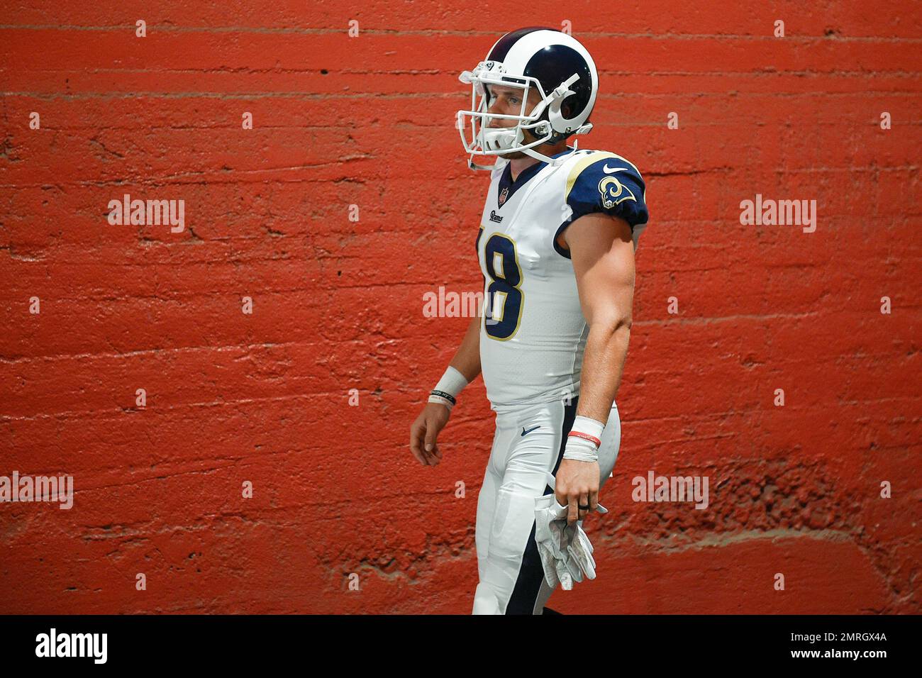 Los Angeles Rams wide receiver Cooper Kupp (18) walks to the field ...