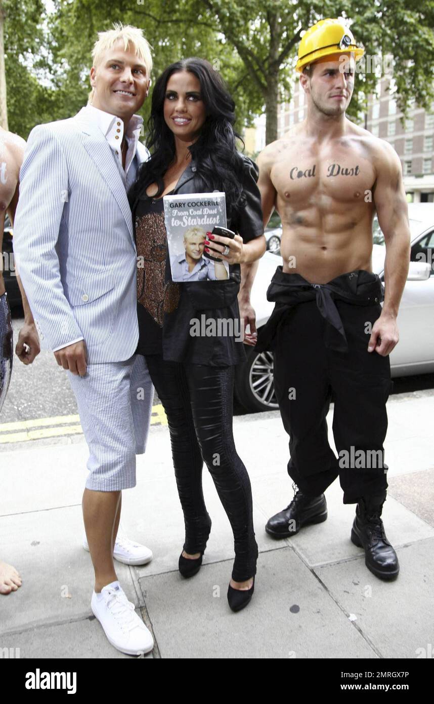 Katie Price (aka Jordan) and Gary Cockerill pose with some hunky models ...