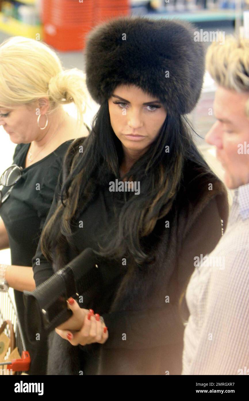 Katie Price looks prepared for even a cold Siberian winter with a huge ...