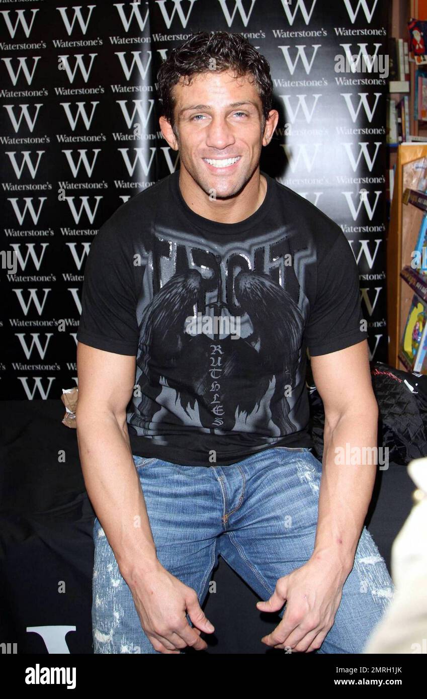 Katie Price (aka Jordan) and boyfriend Alex Reid attend a book signing ...