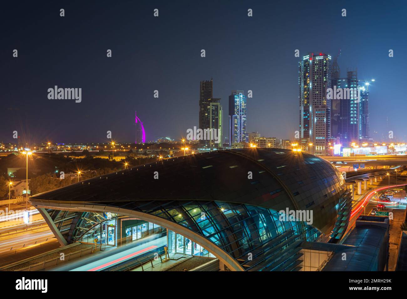 A beautiful night view of the Dubai internet city metro station Stock ...