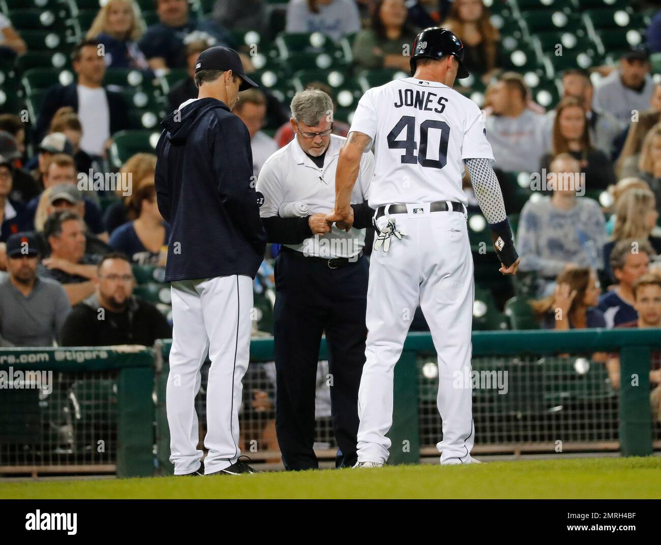Detroit Tigers center fielder JaCoby Jones (40) has his hand looked at ...