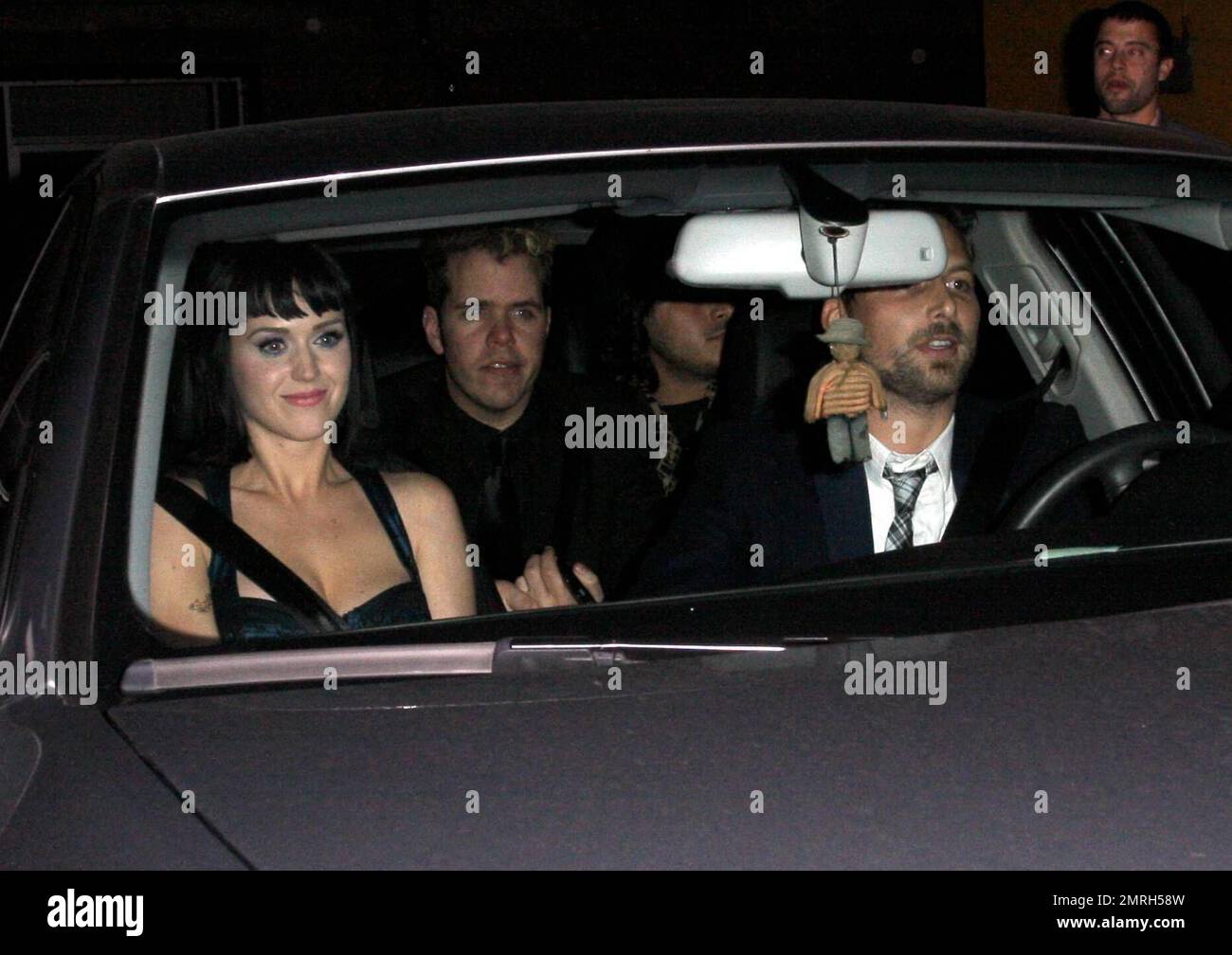 Singer Katy Perry signs autographs as she leaves Bar Deluxe with ...