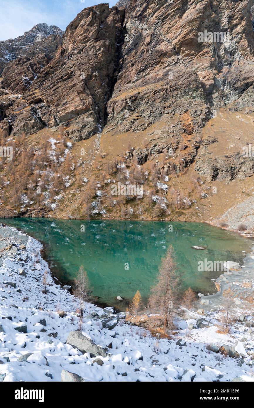 A vertical shot of the Lago Blue lake in Ayas Valley, Monte Rosa ...