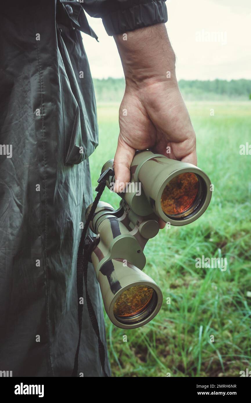 closeup view of hand of huntsman or traveller or border guardian in ...