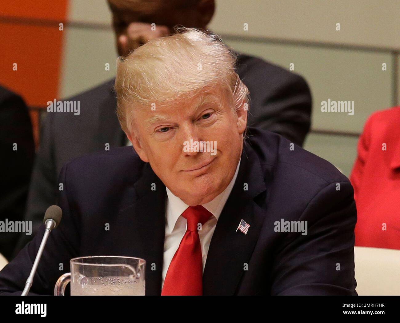 United States President Donald Trump attends a meeting during the ...