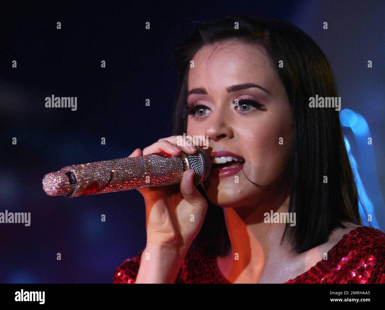 Katy Perry performs at Revolution in a sparkling red dress and made a ...