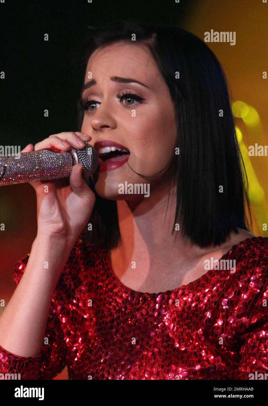 Katy Perry performs at Revolution in a sparkling red dress and made a ...