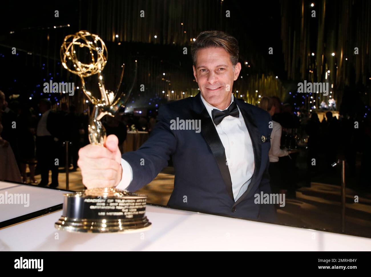 EXCLUSIVE - Lee Metzger poses with his award for for outstanding ...