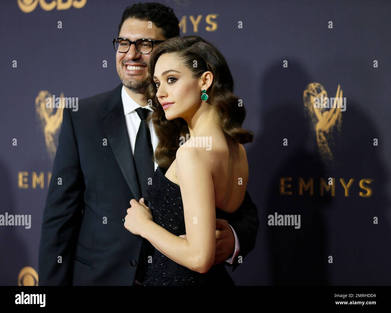 Sam Esmail, left, and Emmy Rossum arrive at the 69th Primetime Emmy ...