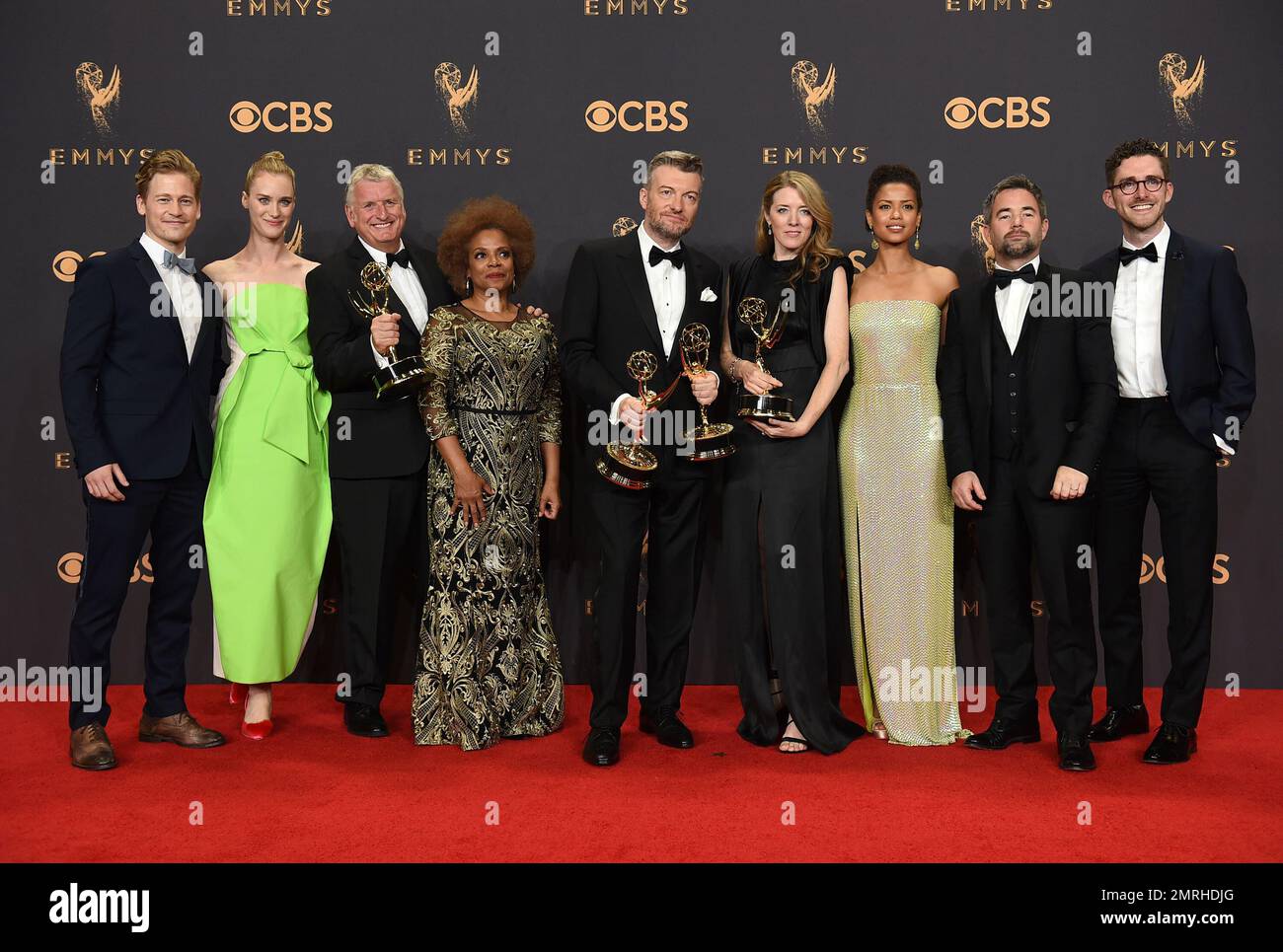 The cast and crew of "Black Mirror: San Junipero" pose in the press ...