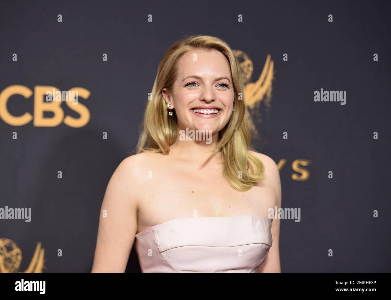 Elisabeth Moss arrives at the 69th Primetime Emmy Awards on Sunday ...