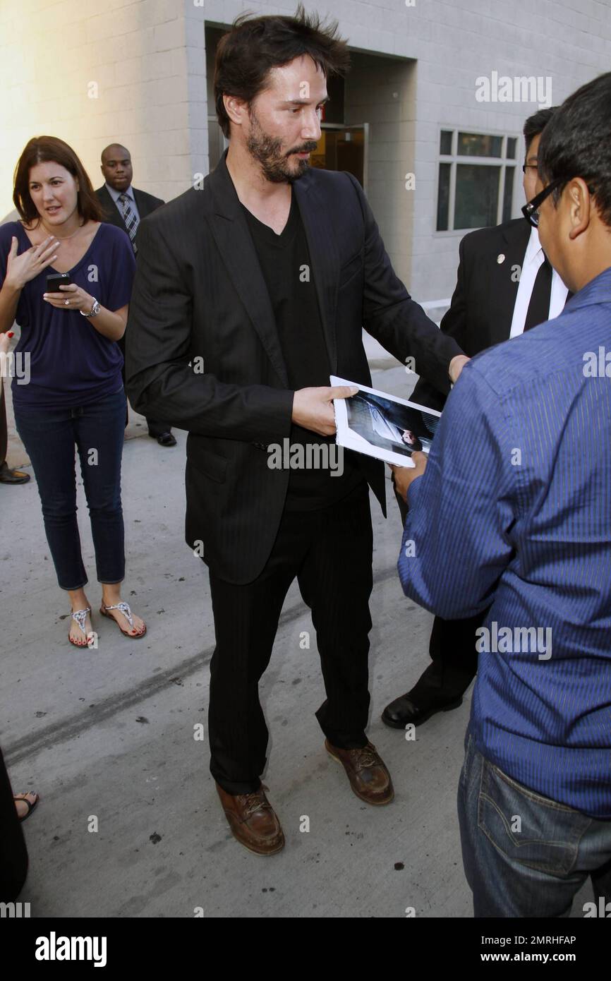 EXCLUSIVE!! Keanu Reeves signs autographs and chats with fans outside ...