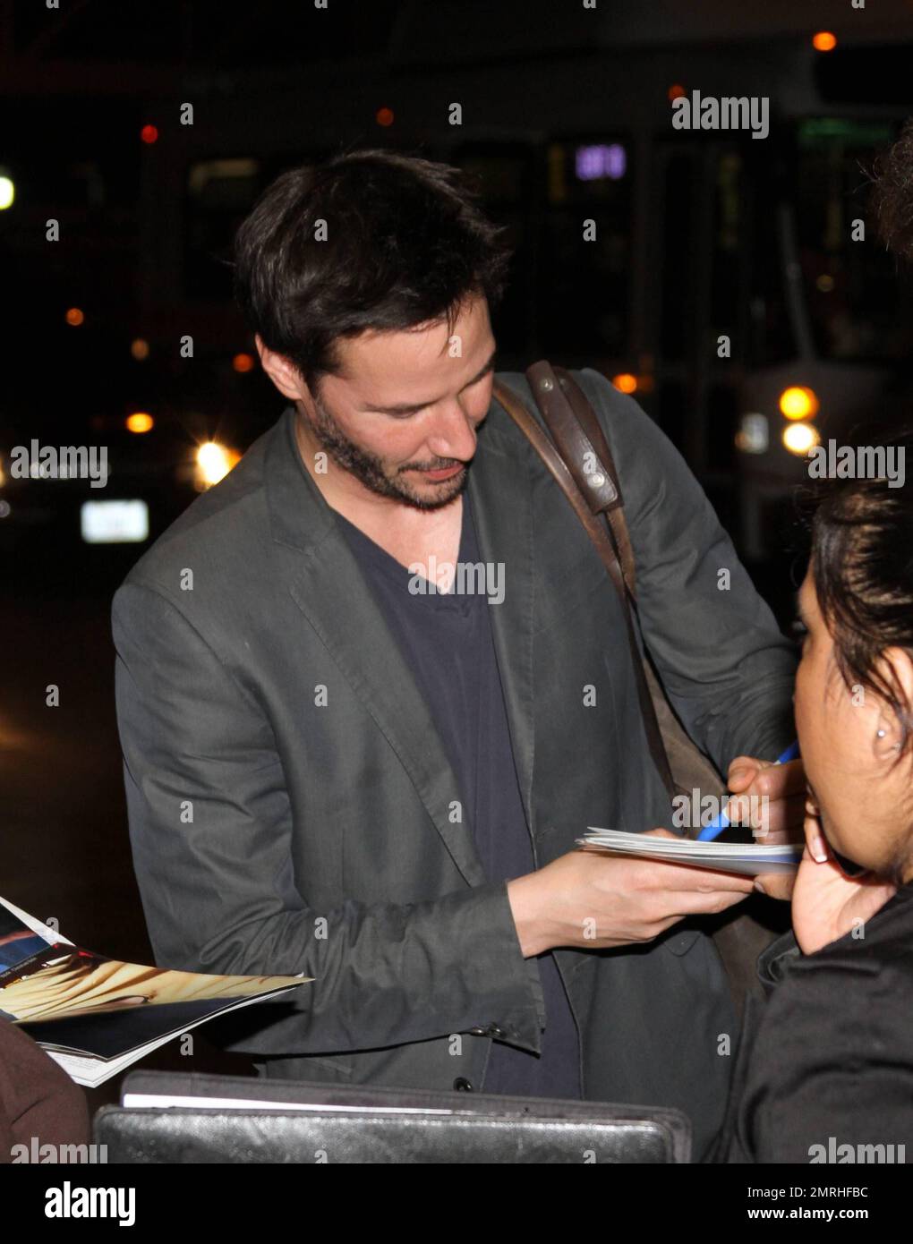 EXCLUSIVE!! Actor Keanu Reeves signs autographs as he arrives at Los ...