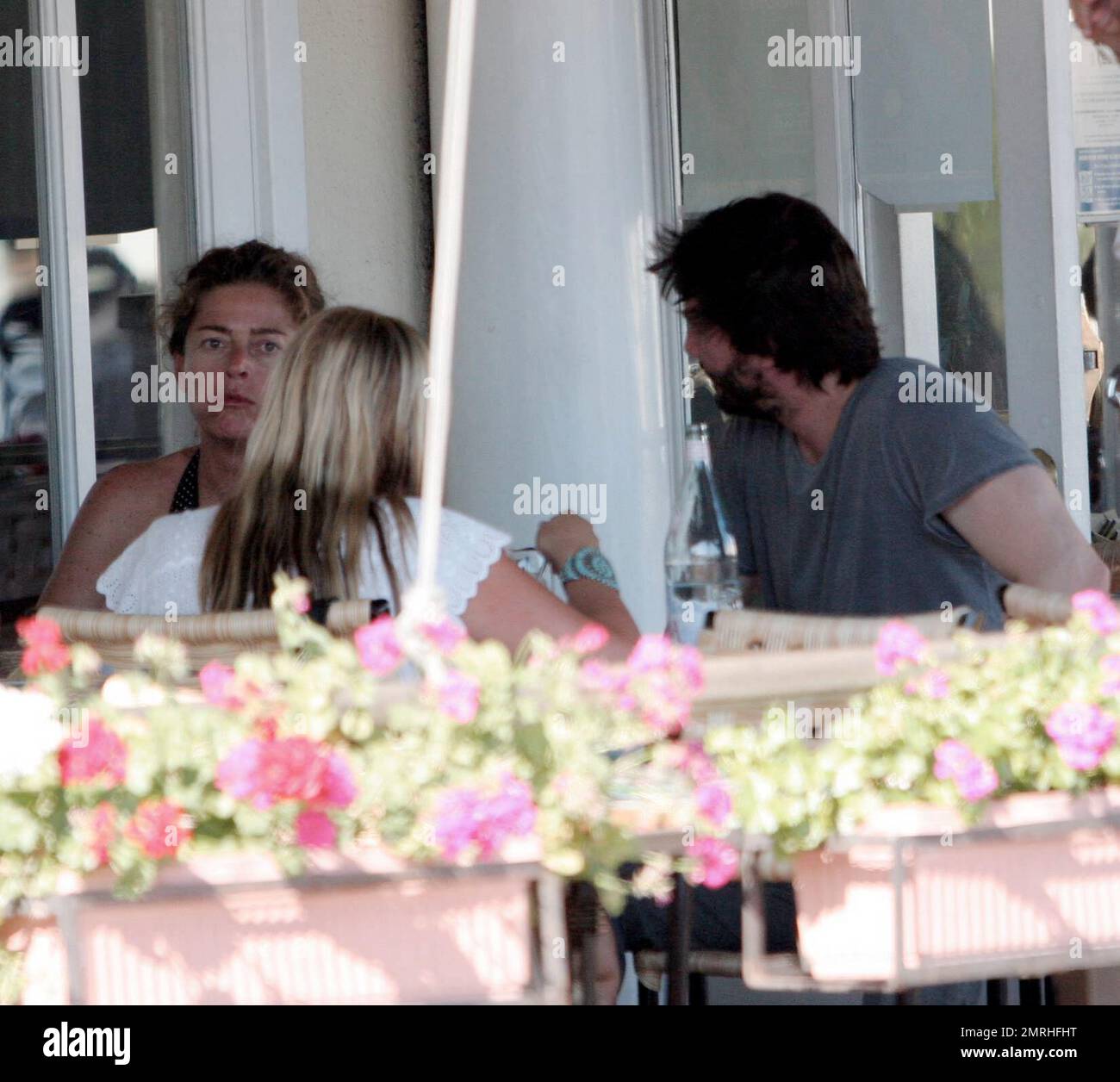 Exclusive!! Keanu Reeves and two female lunch dates dine outside at ...