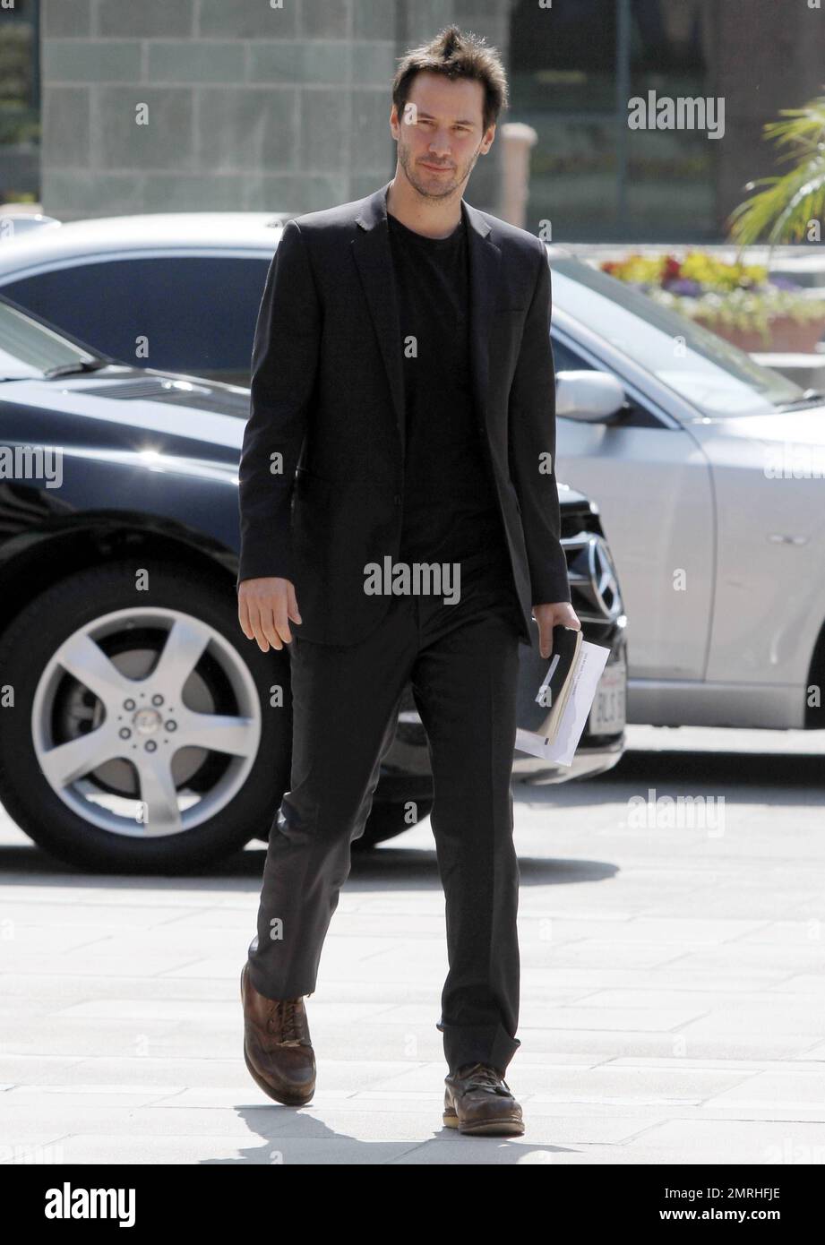 EXCLUSIVE!! Actor Keanu Reeves wears all black paired with some clunky ...