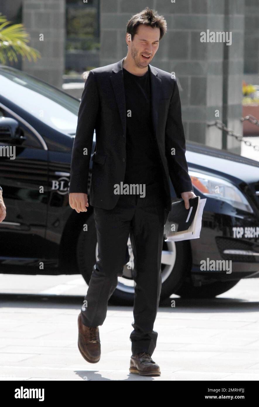 EXCLUSIVE!! Actor Keanu Reeves wears all black paired with some clunky ...