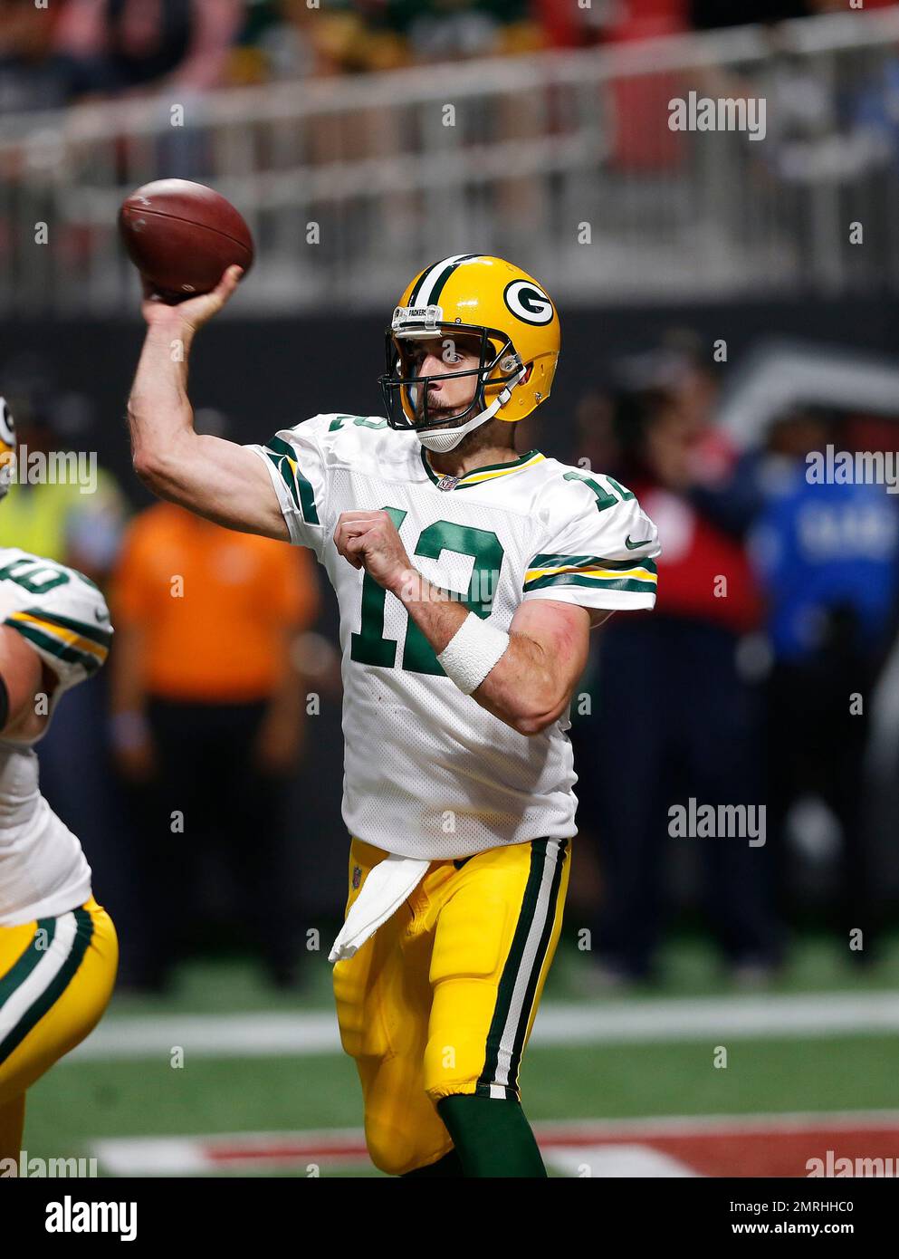 Green Bay Packers quarterback Aaron Rodgers (12) works against the ...
